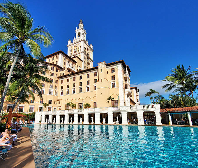 The Biltmore's iconic tower rises above palm trees and a crystal-blue pool, where guests might encounter the ghost of gangster Fatty Walsh or hear phantom jazz music.