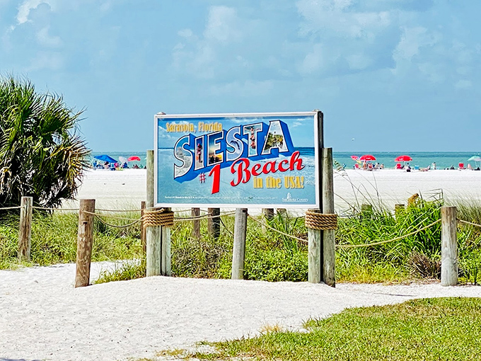 Siesta Key's famous sign welcomes visitors to what many consider America's finest beach, where powder-soft sand awaits bare feet.