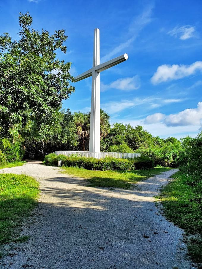 The Great Cross stands tall against Florida skies, commemorating an expedition that covered 4,000 miles of unexplored territory.