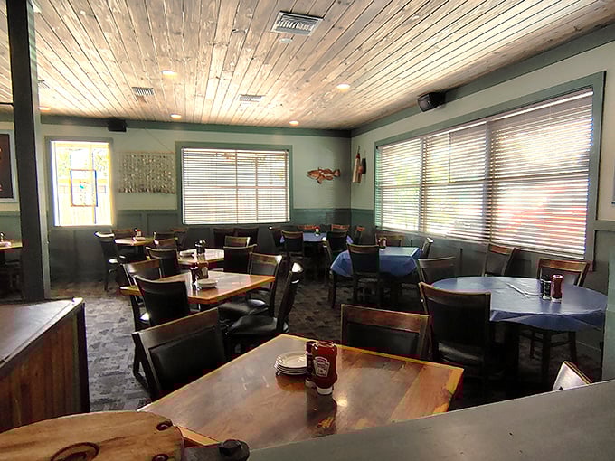 Inside Harry's, the wood-paneled dining room creates a cozy cabin atmosphere. Those simple tables have hosted thousands of memorable seafood feasts!