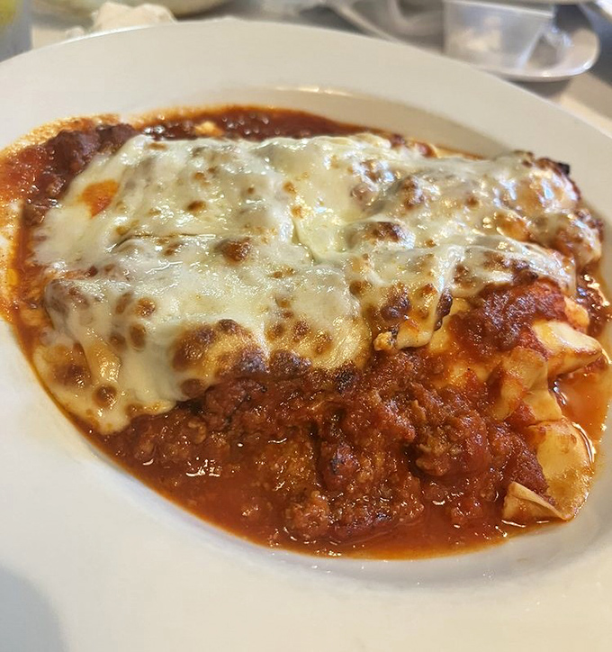 Pasta tubes tucked under a blanket of bubbling cheese and rich tomato sauce&mdash;comfort food that hugs you from the inside out.