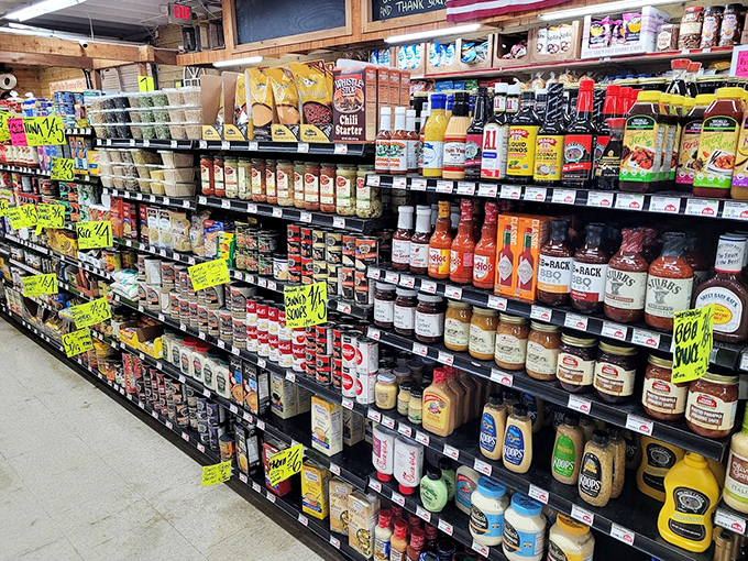 Condiment heaven: Bottles lined up like eager contestants in a flavor competition, each one promising to transform your next meal.