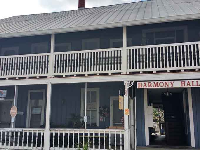 Harmony Hall's wraparound porch invites visitors to slow down and soak in the peaceful atmosphere of this unique community.