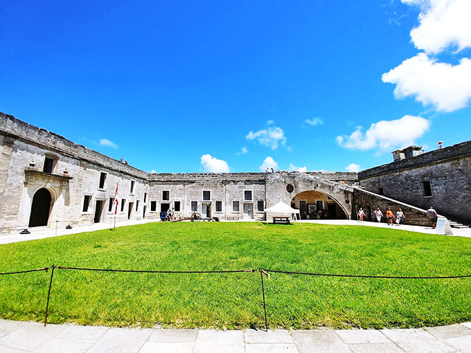 The central courtyard where soldiers once drilled now hosts families creating memories, history meeting the present beautifully.