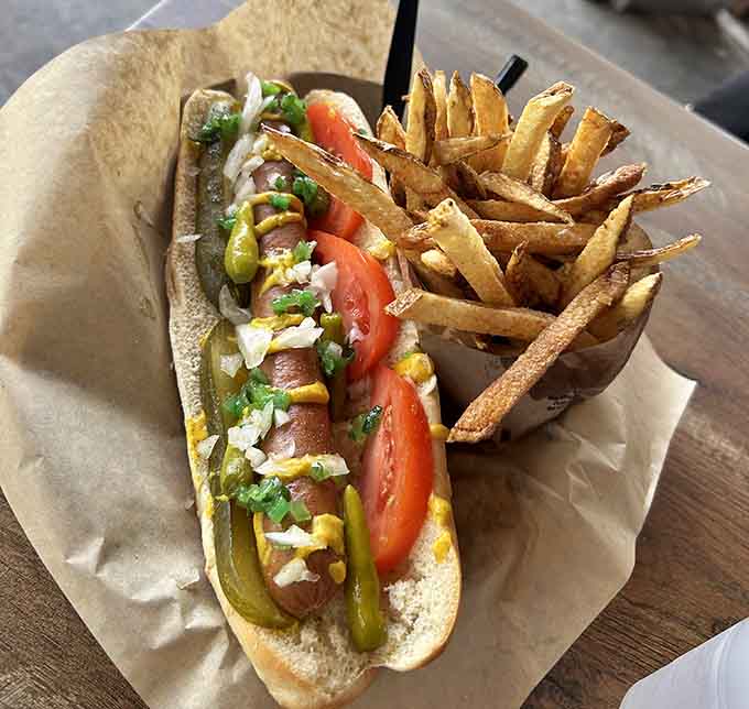 The Chicago Dog comes properly dressed with sport peppers and all the traditional fixings that make this regional specialty legendary.