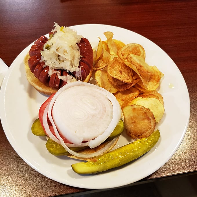 A Windy City classic gets the Florida treatment &ndash; loaded with toppings and nestled beside golden potato chips.