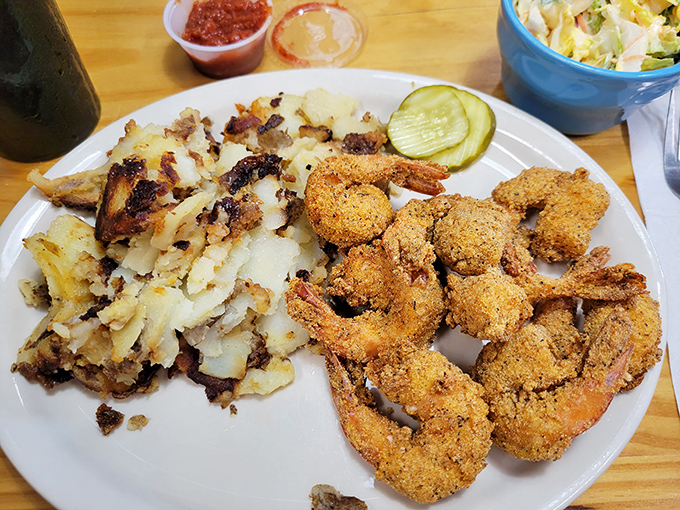 Cornmeal-crusted fried shrimp with a side of hash browns &ndash; comfort food Florida-style that makes you wonder why you'd ever eat seafood anywhere else.