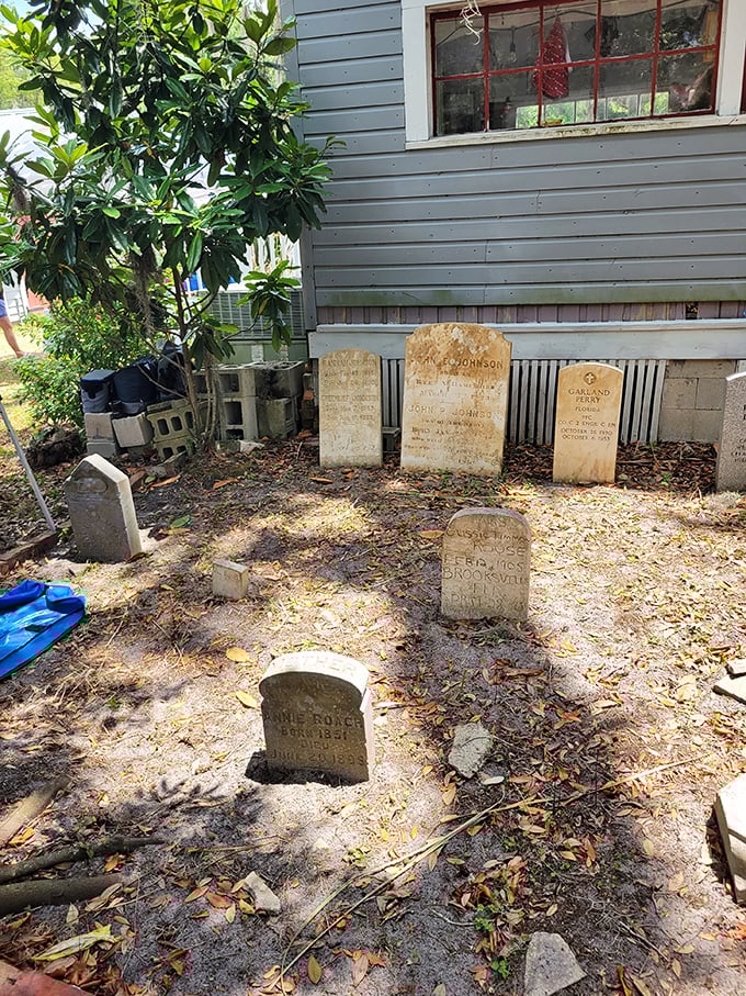 Family tombstones rest beneath the house, a Victorian-era practice that adds another layer to the home's haunted reputation.