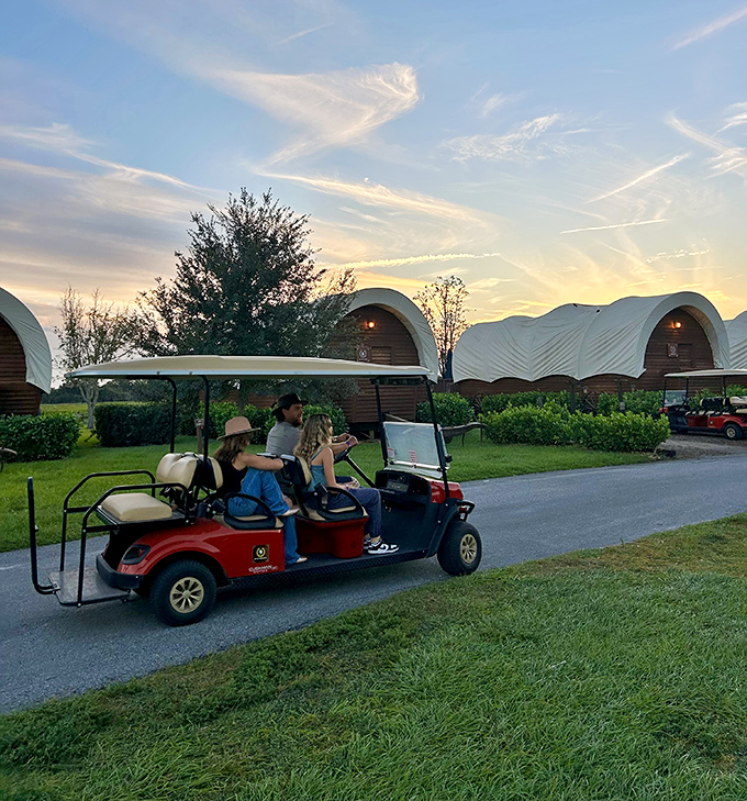 Modern-day pioneers explore the ranch grounds via golf cart &ndash; the preferred transportation of cowboys who value their lower back health.