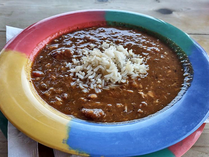 A bowl of seafood gumbo so rich and flavorful, it tells stories of the Gulf with every steaming spoonful.