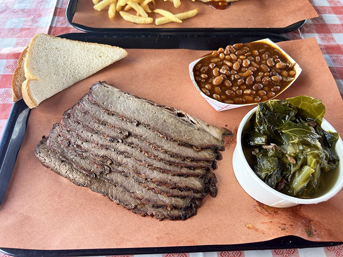 Sliced brisket with that telltale pink smoke ring is barbecue's equivalent of finding the perfect sunset spot.