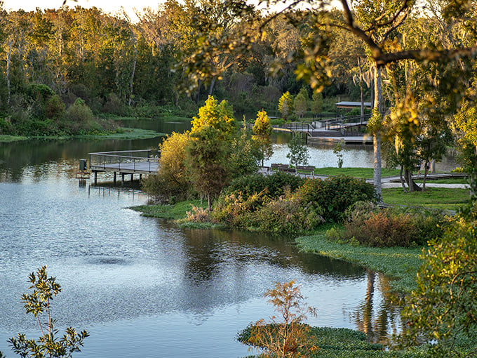 Nature's perfect mirror reflects the sky's masterpiece at golden hour, when the park transforms from playground to painting.