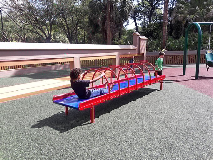This red balance beam offers a perfect test of coordination &ndash; watch as determined youngsters navigate it with the concentration of Olympic gymnasts.