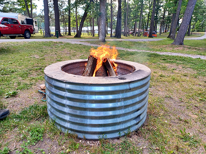 The humble fire ring, where marshmallows meet their delicious destiny and conversation flows as freely as the flames.