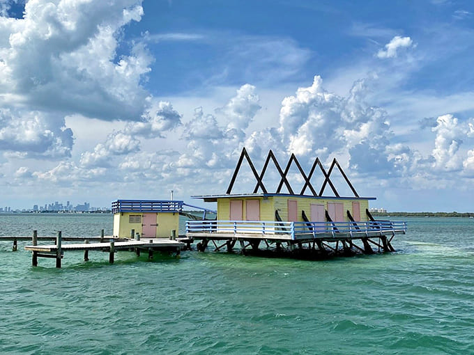 These pastel houses stand on stilts like flamingos, defying storms and time in Biscayne Bay.