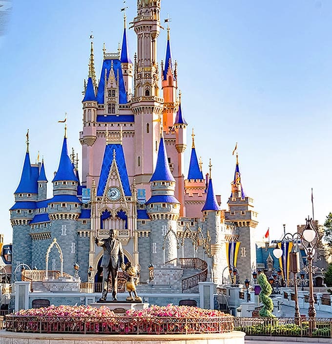 Cinderella Castle stands as the ultimate symbol of Disney magic, where fairy tales become real and adults remember being kids.