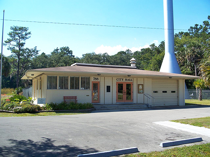 The modest city hall building in St. Marks reflects the village's small size and simple approach to governance in this historic fishing community.