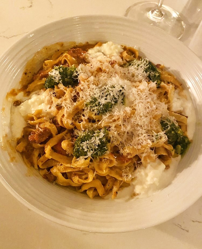 Fresh bolognese playing hide-and-seek under a rich, slow-simmered sauce that someone's Italian grandmother would approve of wholeheartedly.