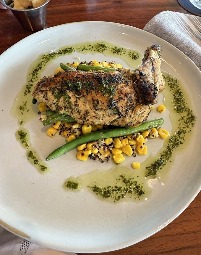 The Herb-Roasted Chicken proves this kitchen isn't just a one-trick pony. That crispy skin should be illegal in at least seven states.