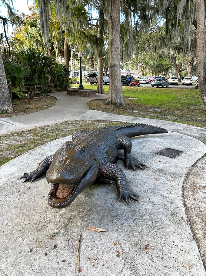 This bronze alligator statue greets park visitors with a toothy grin, offering a safer selfie opportunity than its living relatives nearby.
