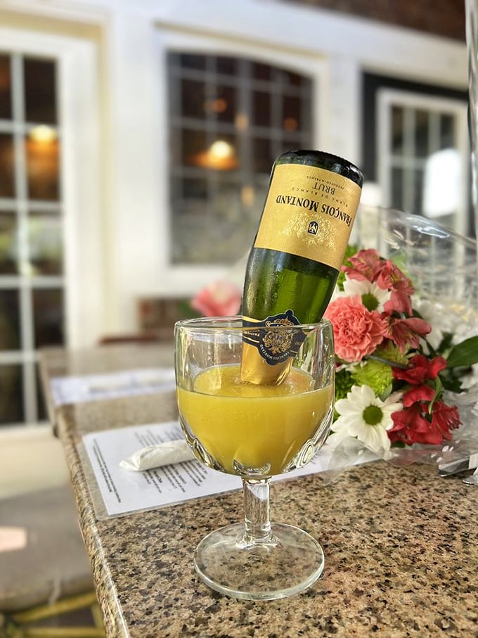 That's not just a mimosa&mdash;it's sunshine in a glass, complete with a tiny champagne bottle doing a cheerful headstand.