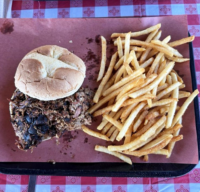 This pulled pork sandwich isn't just lunch&mdash;it's what happens when smoke, patience, and a soft bun have a beautiful reunion.