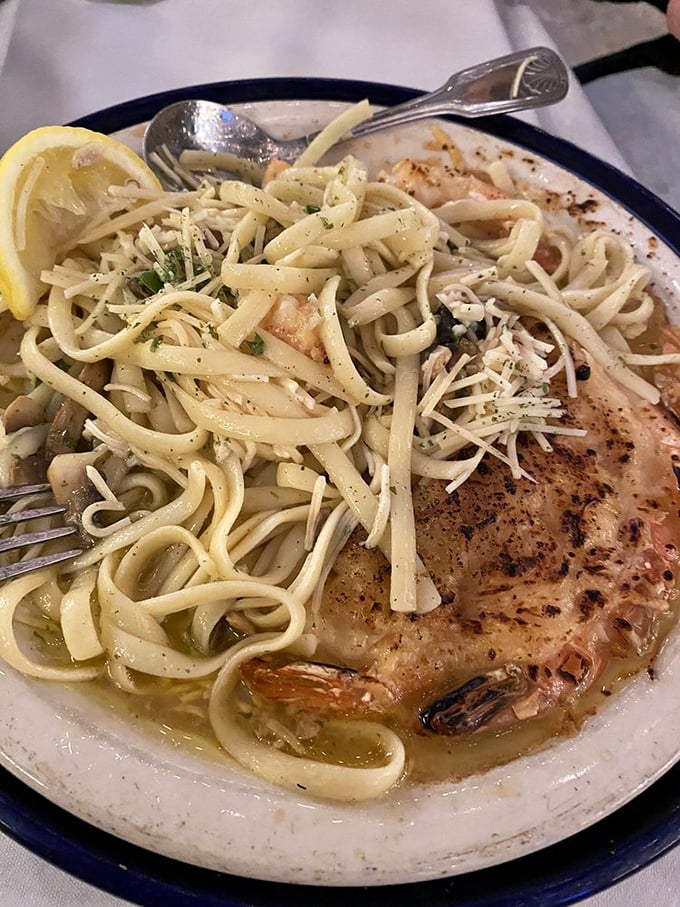 Pasta and shrimp that would make an Italian grandmother nod in approval—swimming in butter instead of chlorine.