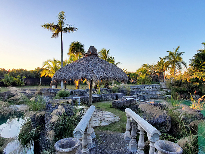 As golden hour approaches, the thatched palapa becomes the perfect sunset-watching spot above the glimmering turquoise waters.