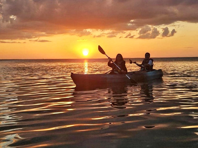 Sunset transforms ordinary waters into liquid gold, proving that sometimes the journey itself outshines the destination.