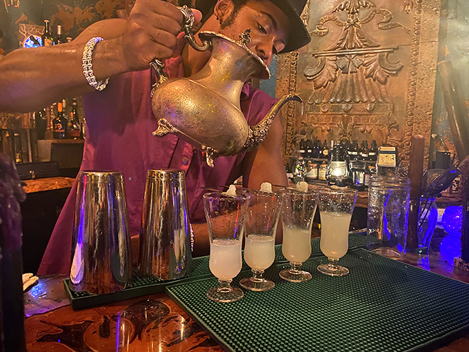 Bartenders at Cocktails & Screams don't just mix drinks &ndash; they create theatrical experiences, pouring from ornate vessels with dramatic flair.