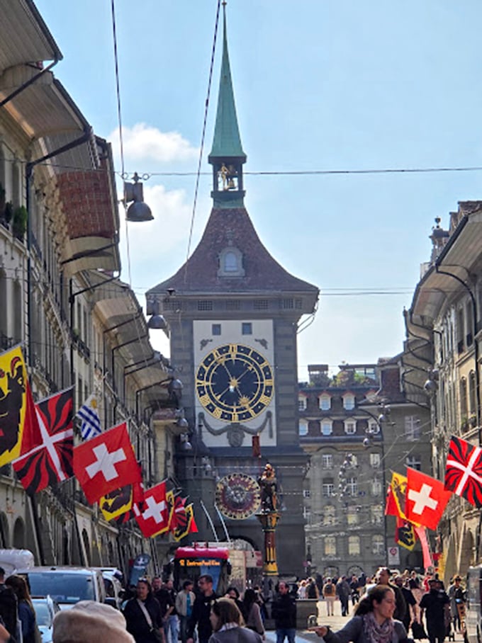 Bern's iconic clock tower stands as a timeless sentinel, counting moments for centuries of passersby.