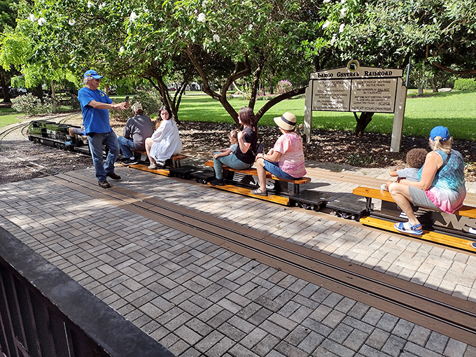 Multi-generational joy as families squeeze onto these perfectly proportioned passenger cars for a journey through the park.