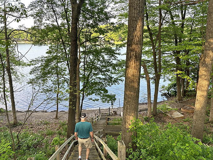 These wooden steps lead to more than just the lake &ndash; they're a stairway to tranquility that urban life simply can't match.
