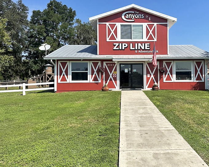 The Canyons' bright red barn welcomes adventure-seekers to Florida's surprising limestone quarry playground.