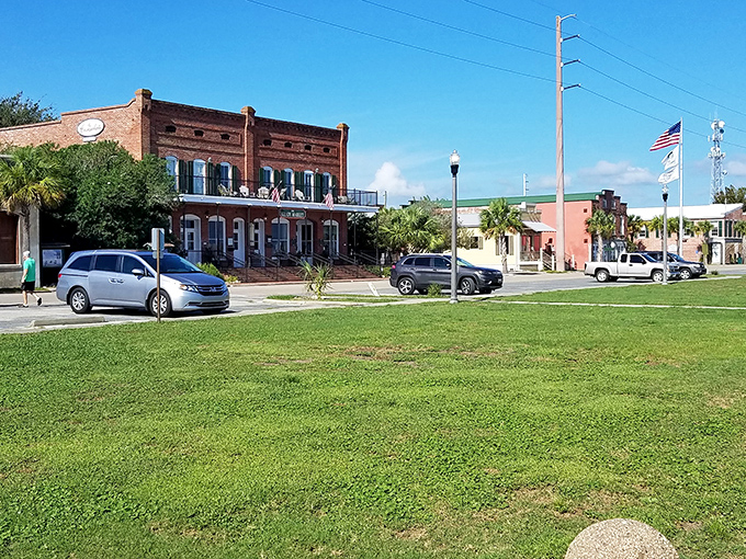 The sleepy streets of Apalachicola invite afternoon strolls, where moss-draped trees provide shade for buildings that have witnessed centuries of coastal life.