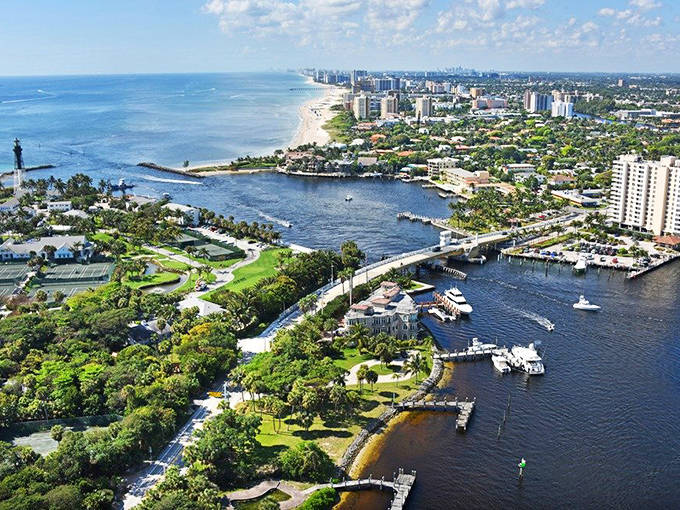 Coastal views dominate this stretch of A1A, where palm trees sway in ocean breezes and beachgoers enjoy the sand and surf.