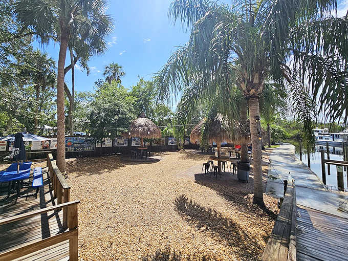 Tiki huts and palm trees create a laid-back vibe at The Freezer, where picnic tables and cold drinks await hungry boaters after a day on the water.