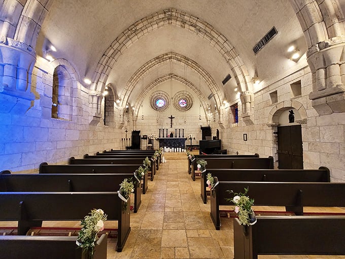 The chapel's soaring ceiling and simple wooden pews create a sanctuary of peace that has served its spiritual purpose across continents.