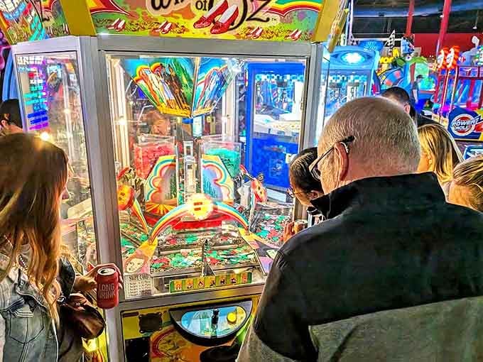 Coin pusher machine: The mesmerizing cascade of tokens teeters perpetually on the edge of a jackpot, teaching patience and probability in equal measure.