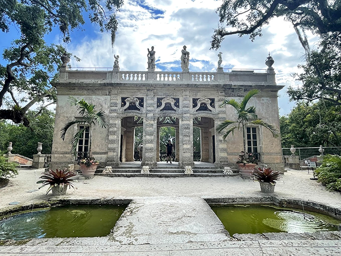 The garden pavilion stands like a miniature palace, making your backyard shed hang its head in architectural shame.