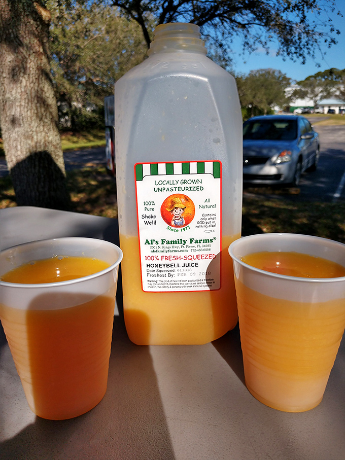 Al's Family Farms honeybell juice &ndash; nature's sweetness captured in a bottle, no artificial anything needed. 