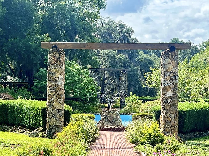 River Gardens State Park's stone archway invites visitors into a verdant wonderland where Florida's natural beauty takes center stage in a theatrical display.