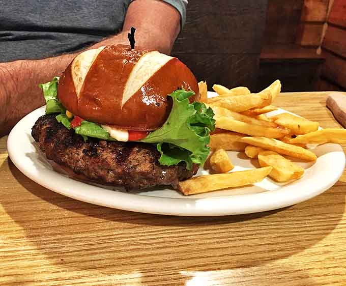Burger and fries: Beef's other perfect form arrives on a pretzel bun. Those golden fries are the supporting actors who steal scenes.