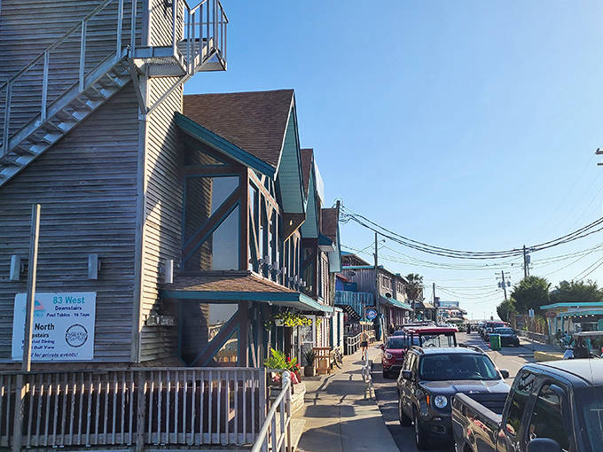 Cedar Key's historic downtown features weathered wooden buildings with second-story balconies perfect for people-watching on a lazy afternoon.