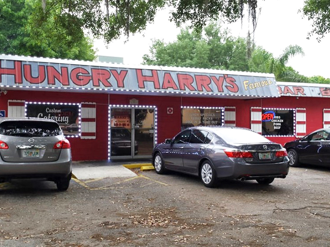 Hungry Harry's bold red exterior announces its barbecue mission without fancy frills. That classic roadside look promises authentic, time-tested flavors inside!