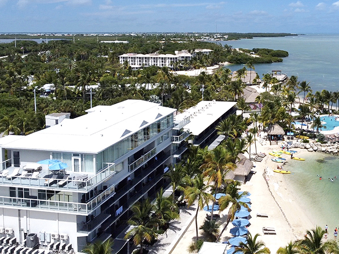 Islamorada's waterfront bursts with color at Robbie's Marina, where shops painted in tropical hues compete with the brilliant blues of Florida Bay.