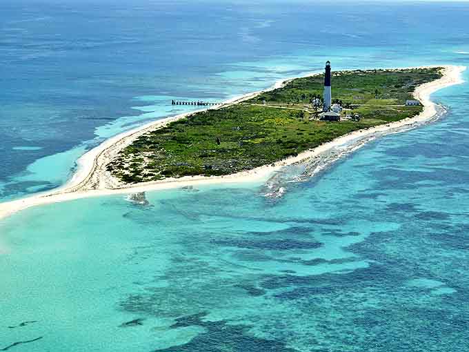 Loggerhead Lighthouse stands tall on this remote island, surrounded by nothing but sand and sea.