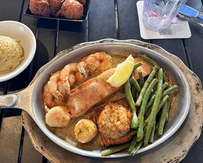 The Broiled Captain's Platter showcases the kitchen's philosophy: when you have seafood this fresh, simple preparation lets the natural flavors shine.