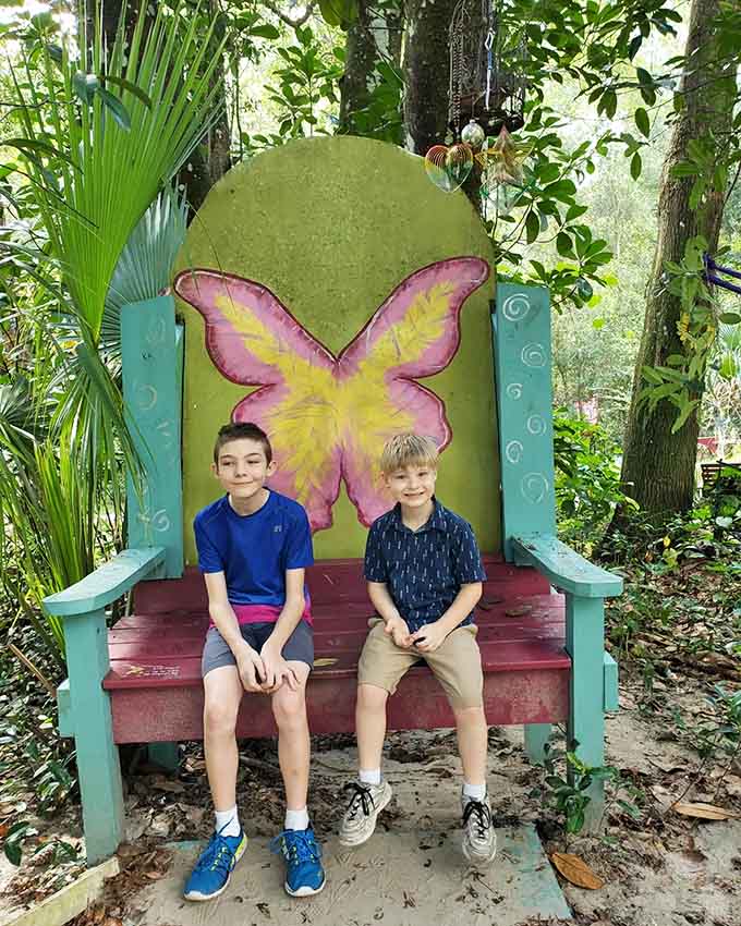 Young visitors pose with fairy wings, demonstrating that the magic of this place transcends age and appeals to the believer in all of us.