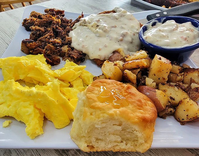 A breakfast platter that covers all the major food groups: eggs, meat, potatoes, and "things that make you happy" – served with a side of morning sunshine.